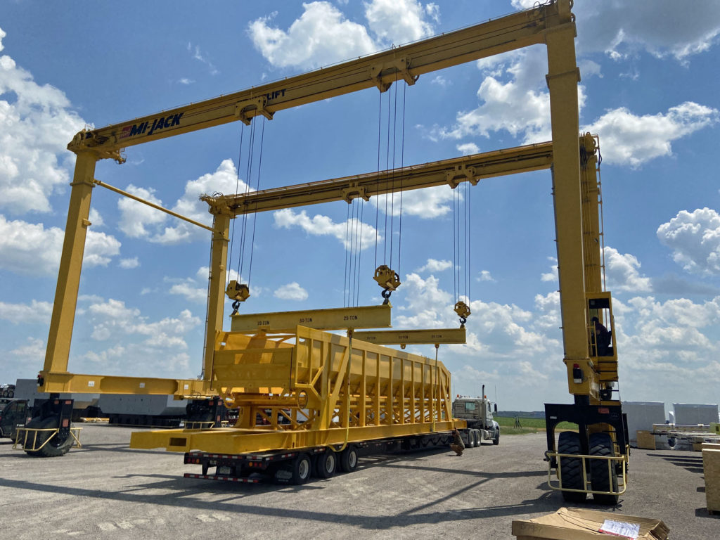 Unloading and Warehouse Storage with 100-ton Straddle Crane in MN